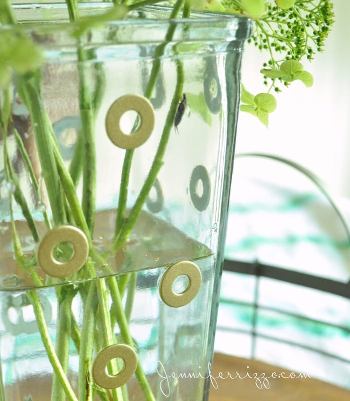 Glue gold washers to a vase for an enexpected twist - Jennifer Rizzo