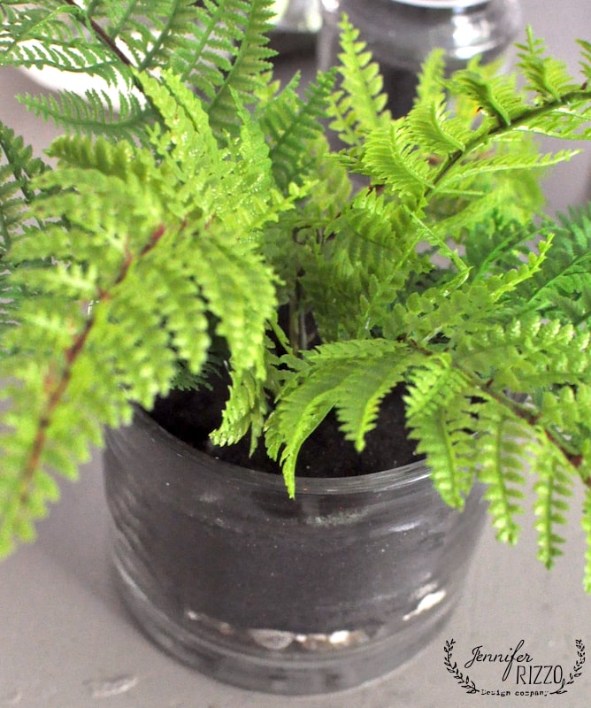 Faux fern in soil and glass vase made from clay - Jennifer Rizzo